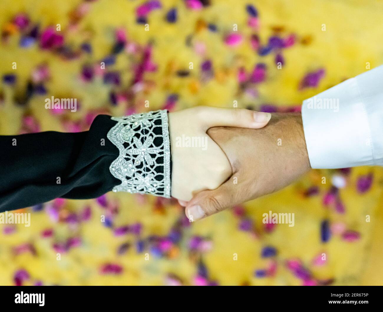 Arabic muslim people hands together forming a symbol Stock Photo - Alamy