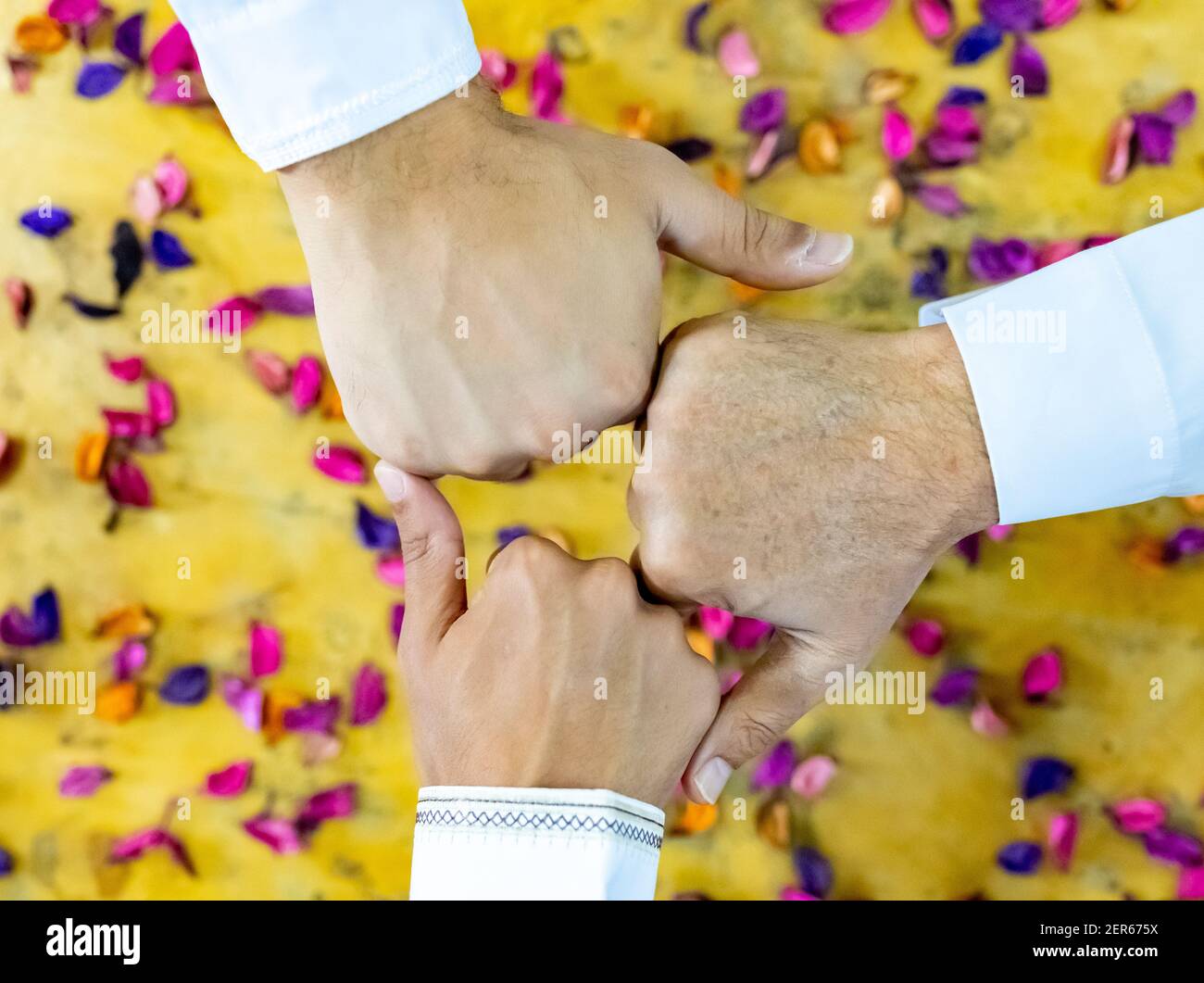 Arabic muslim people hands together forming a symbol Stock Photo - Alamy