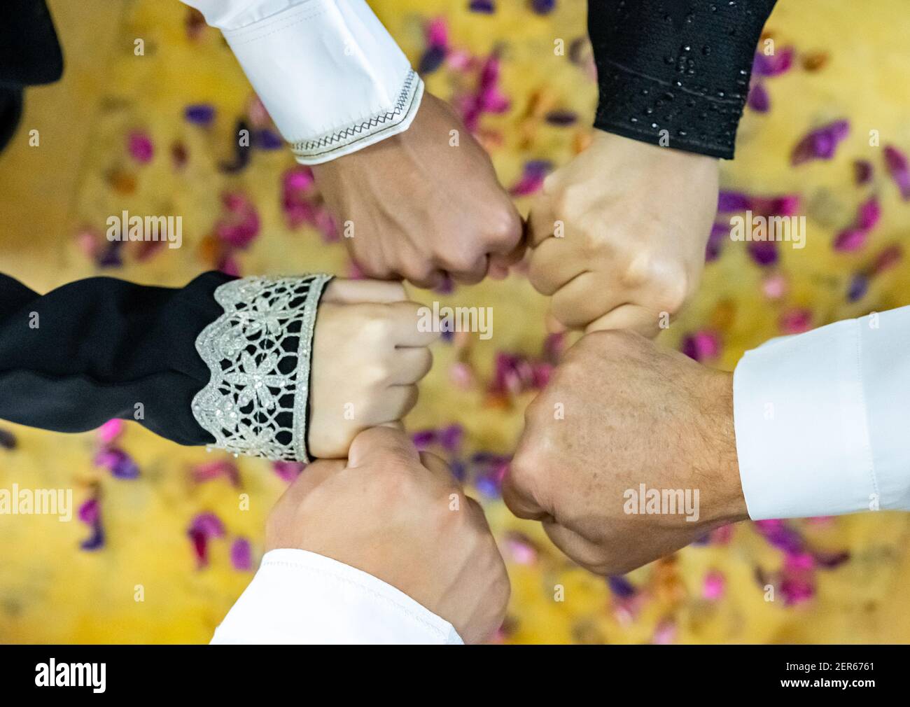 Arabic muslim people hands together forming a symbol Stock Photo - Alamy