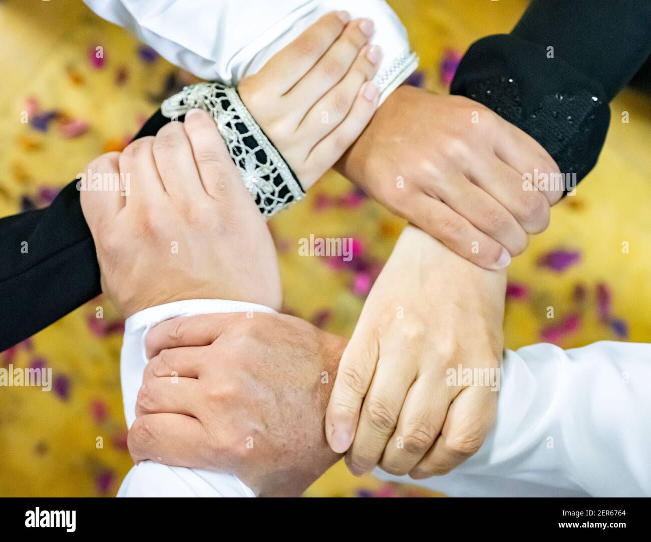 Arabic muslim people hands together forming a symbol Stock Photo - Alamy