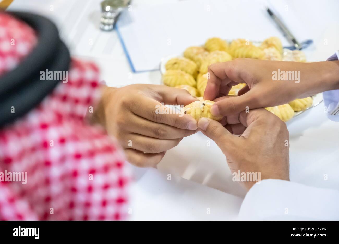 Arabic muslim business people gathered for meeting Stock Photo - Alamy