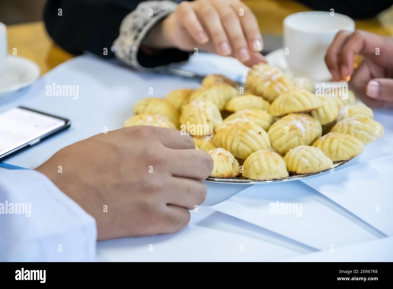 Arabic muslim business people gathered for meeting Stock Photo - Alamy