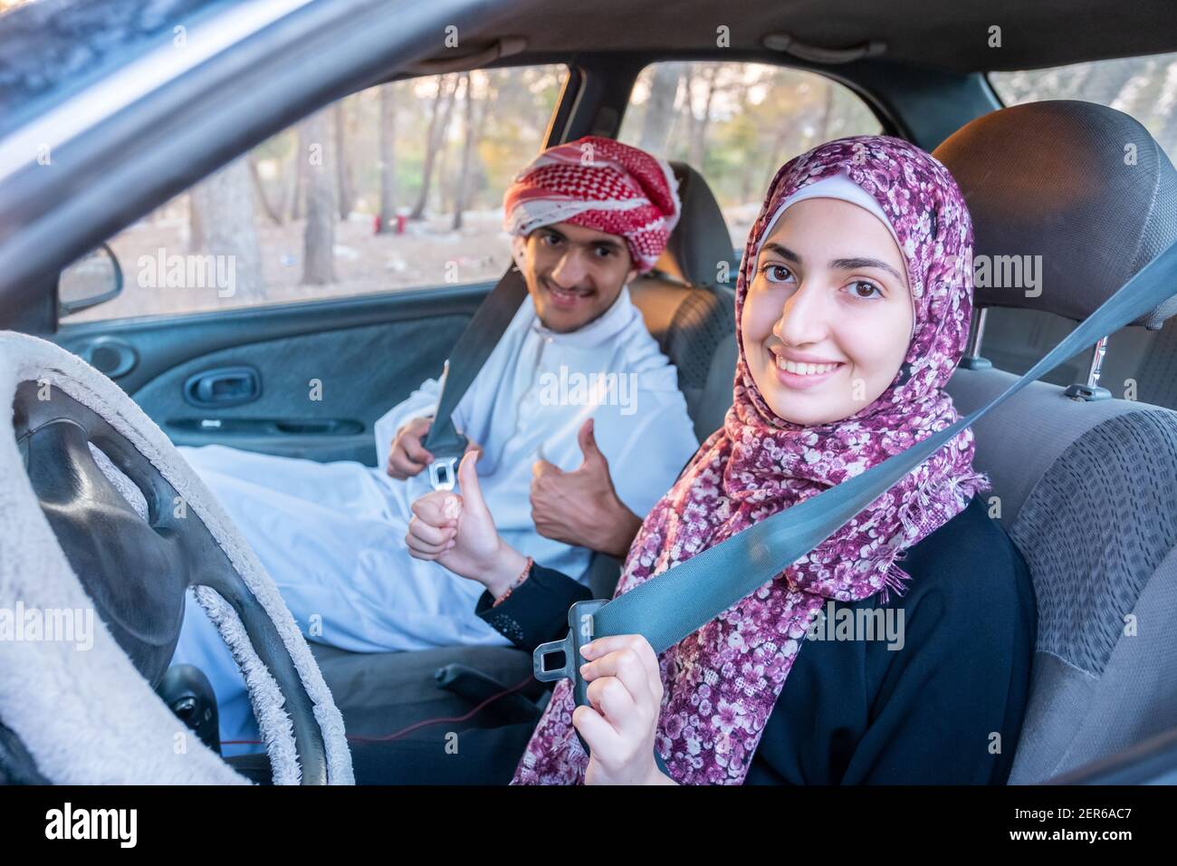 Professional muslim woman driving her car Stock Photo - Alamy