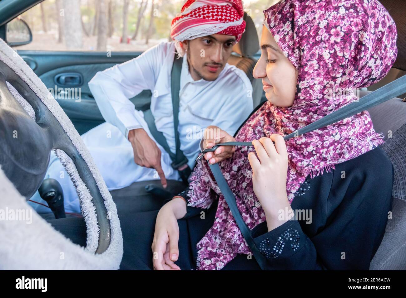 Professional muslim woman driving her car Stock Photo - Alamy