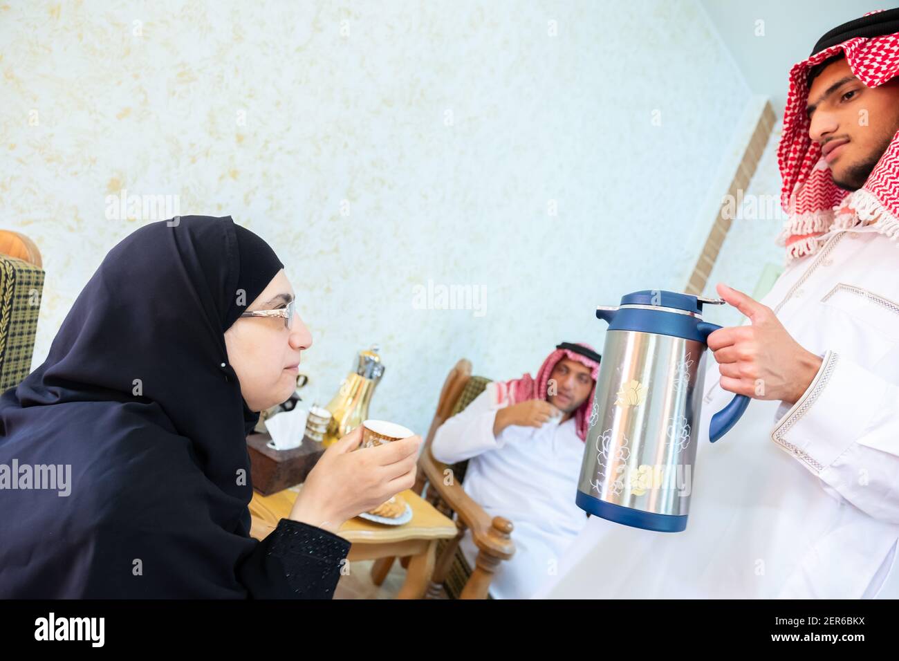 Couple being served coffee hi-res stock photography and images - Alamy