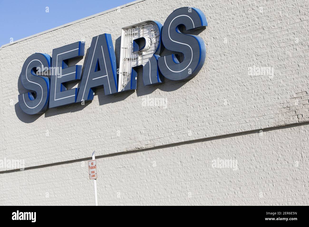 A logo sign outside of a Sears retail store in Annapolis, Maryland on ...