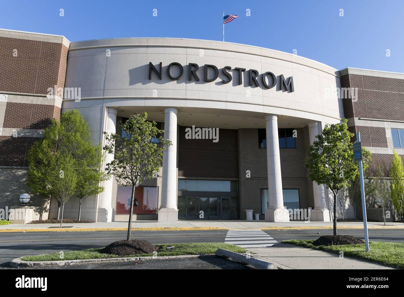 A logo sign outside of a Nordstrom retail store in Annapolis, Maryland ...