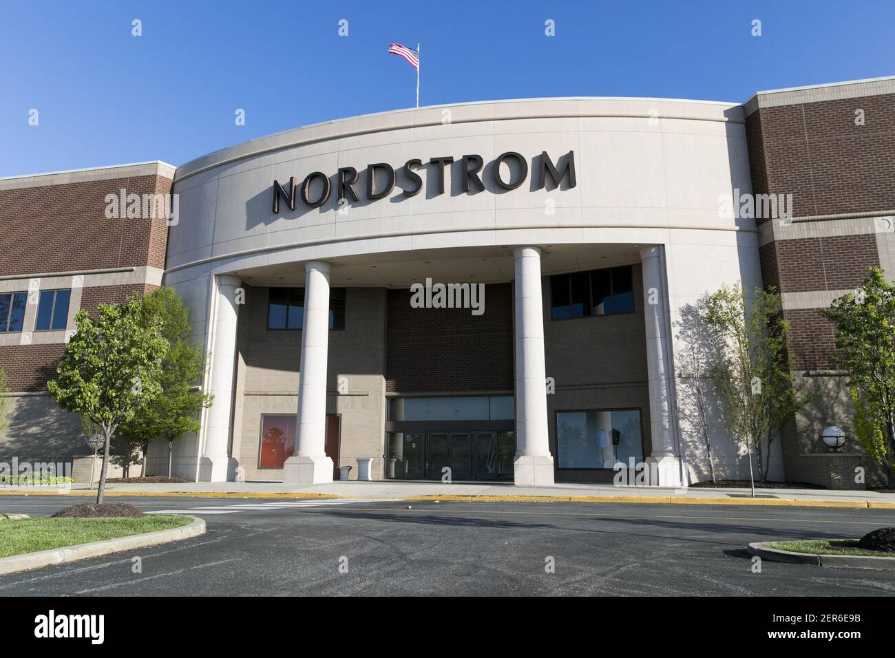 A logo sign outside of a Nordstrom retail store in Annapolis, Maryland ...