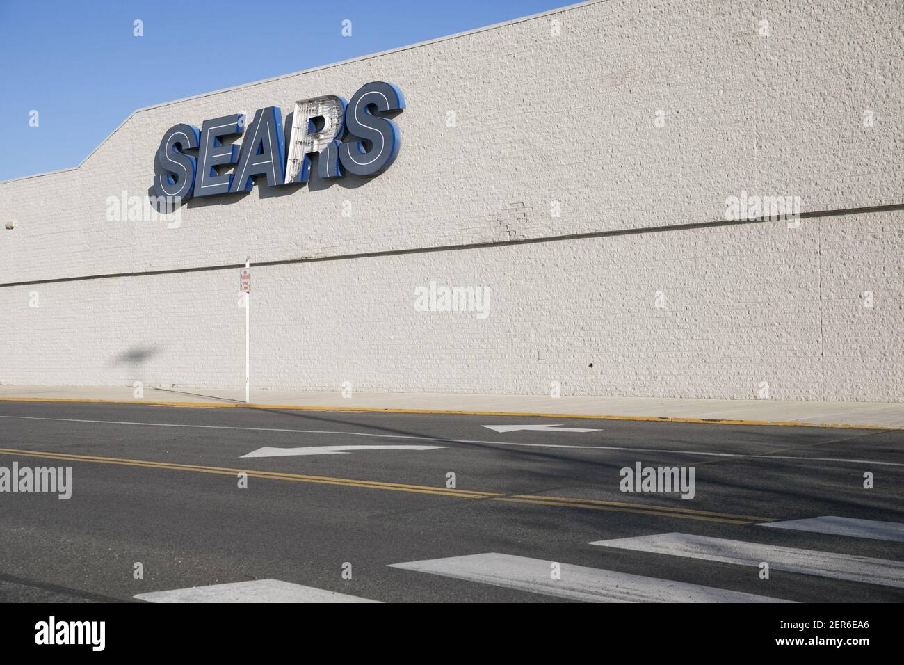 A logo sign outside of a Sears retail store in Annapolis, Maryland on ...