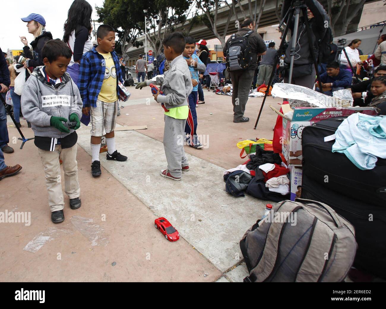 A child plays with a remote control car in Tijuana, Baja California ...