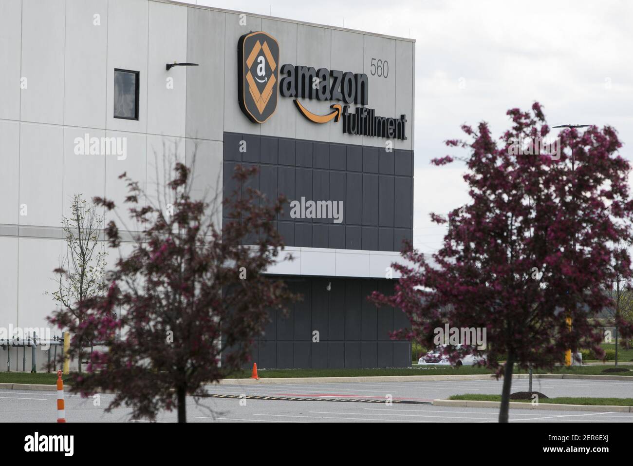 A logo sign outside of a Amazon fulfillment center in Middletown ...
