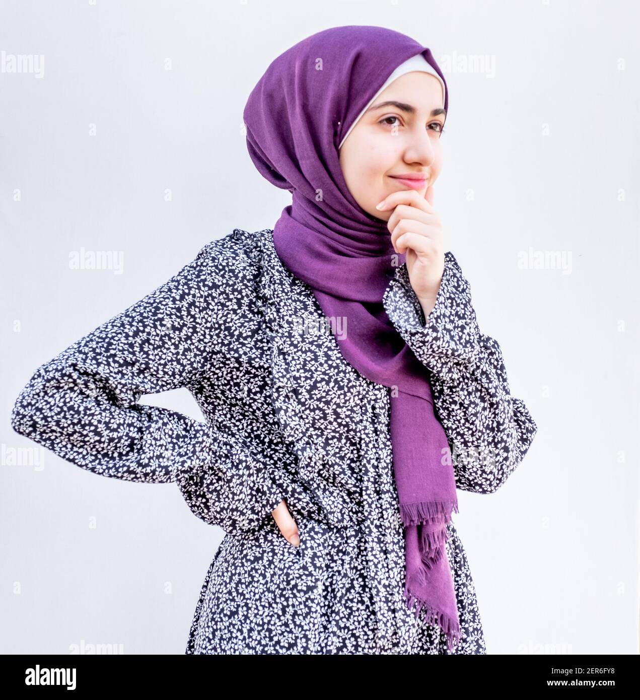 Arabic muslim girl having hard time thinking Stock Photo - Alamy