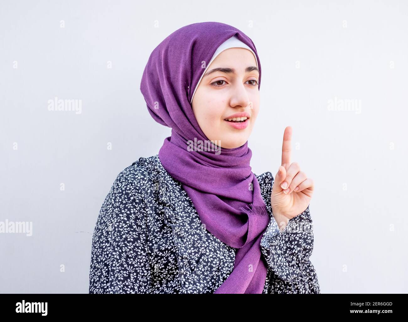 Arabic muslim girl having hard time thinking Stock Photo - Alamy
