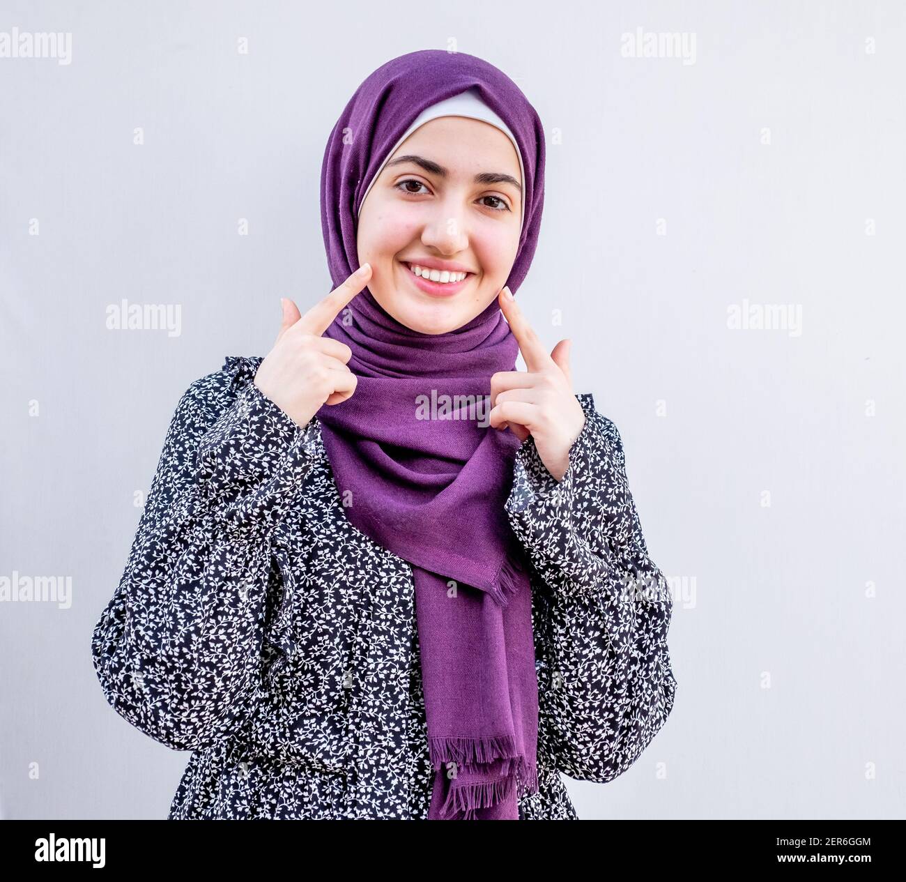Arabic muslim girl smiling from fun Stock Photo - Alamy