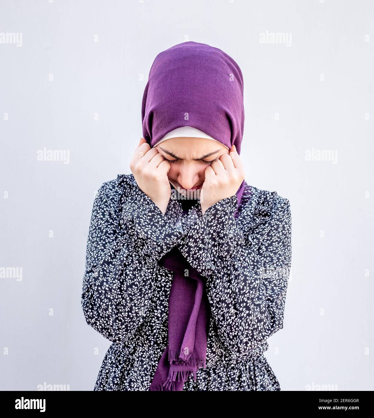 Arabic muslim girl having hard time thinking Stock Photo - Alamy