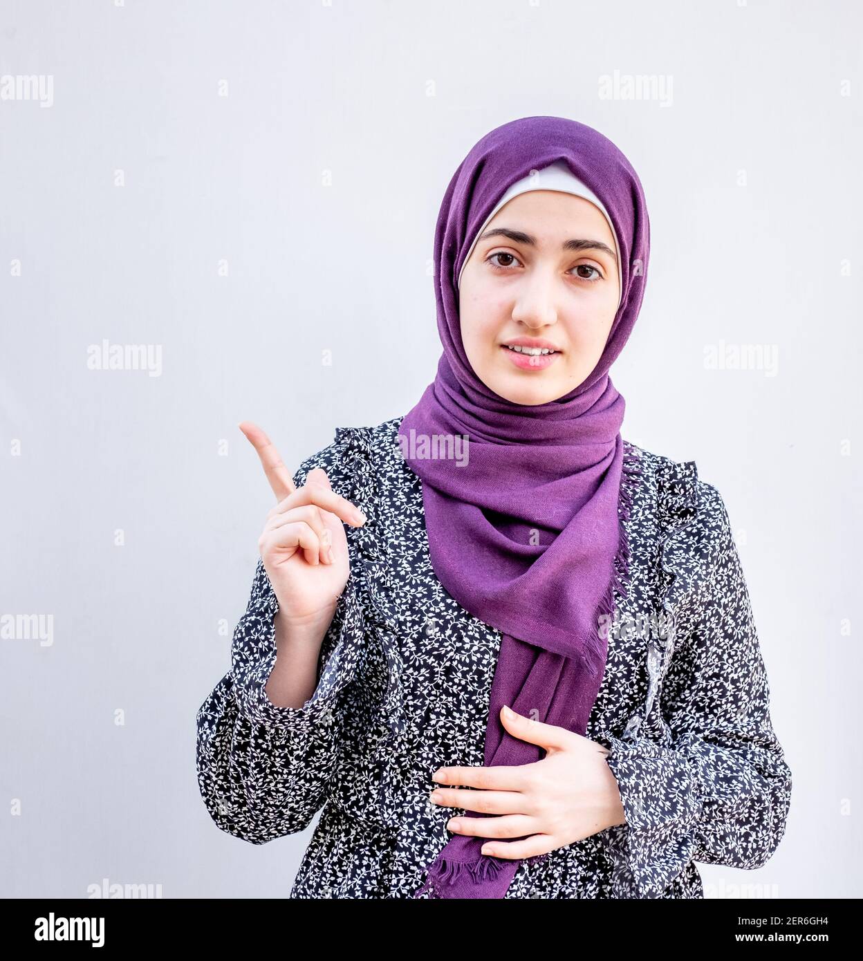 Arabic muslim girl having hard time thinking Stock Photo - Alamy