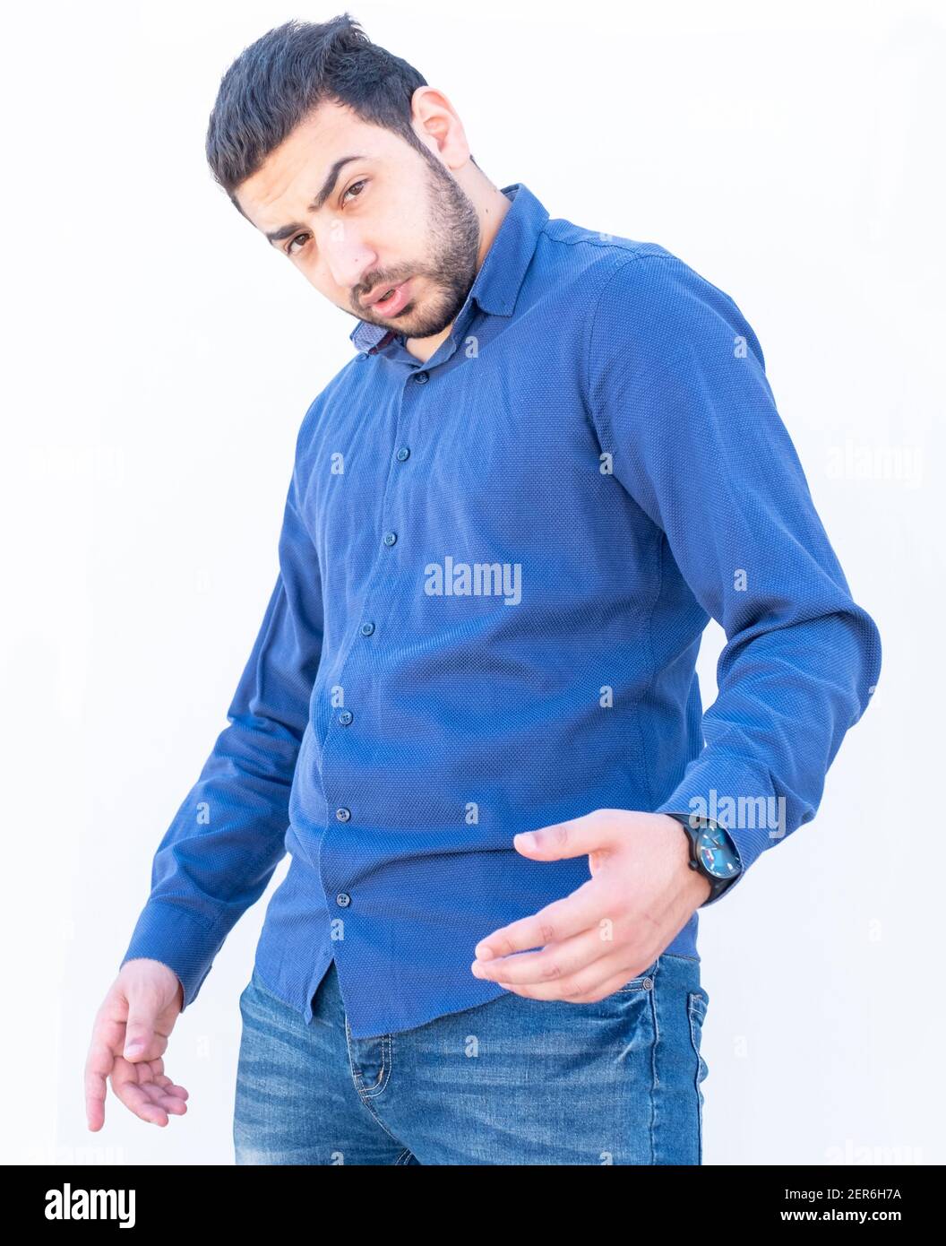 Arabic guy posing for portrait photo Stock Photo - Alamy