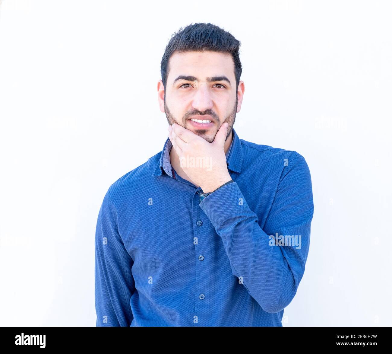 Arabic guy posing for portrait photo Stock Photo - Alamy