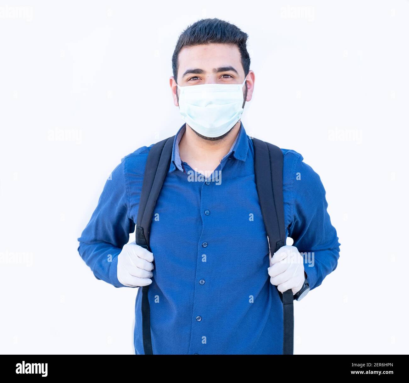 Arabic guy wearing healthy mask and smiling Stock Photo - Alamy