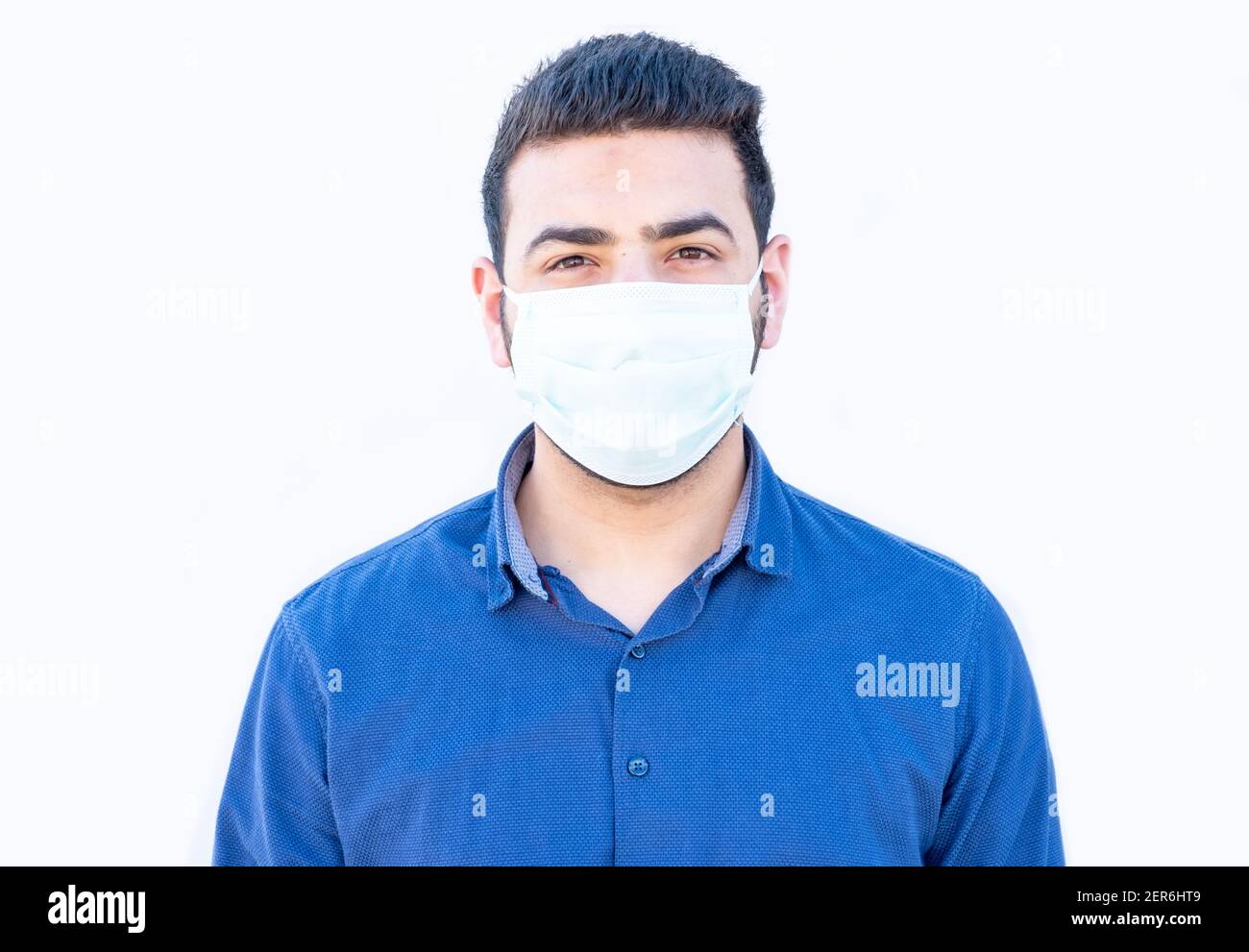 Arabic guy wearing mask for protection Stock Photo - Alamy