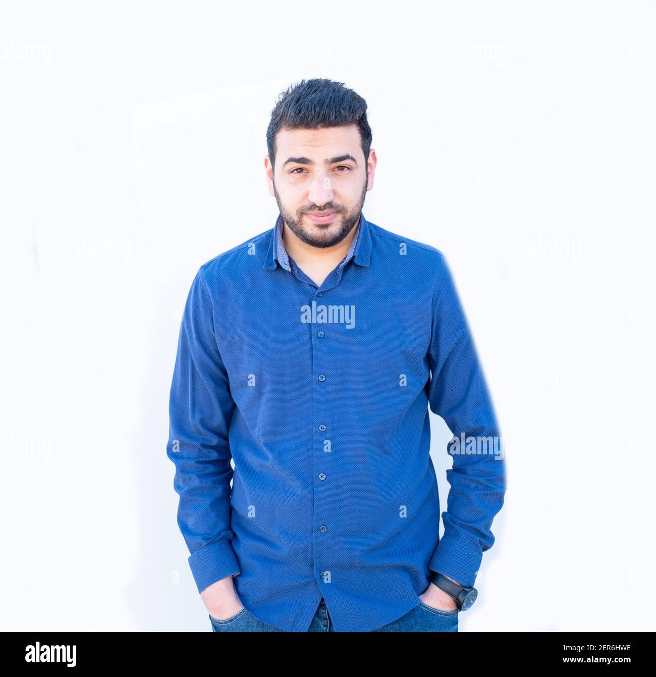 Arabic guy posing for portrait photo Stock Photo - Alamy