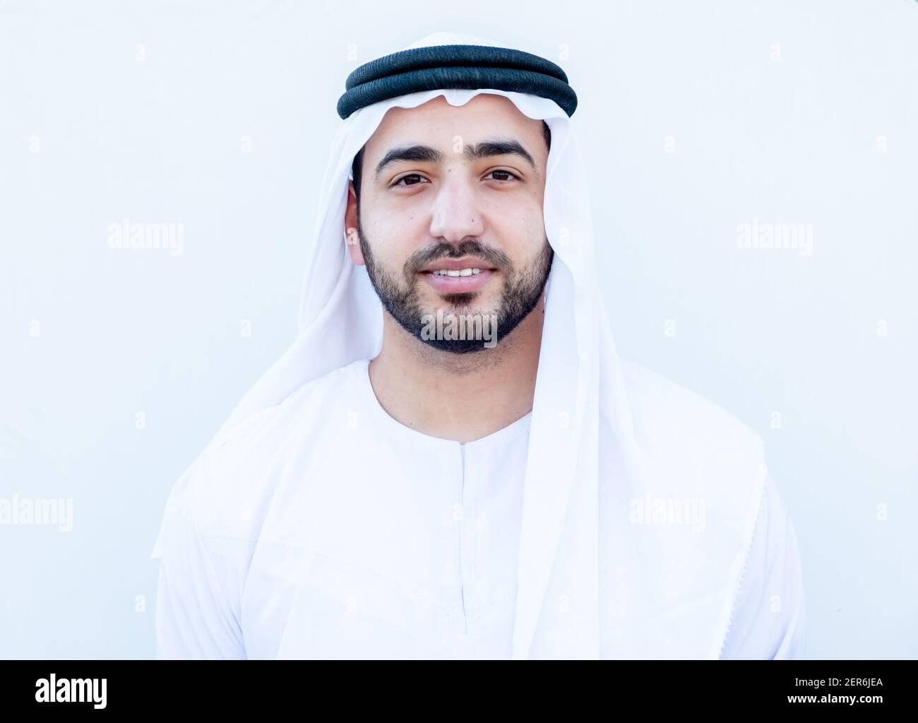 Arabic guy smiling and feeling happy Stock Photo - Alamy