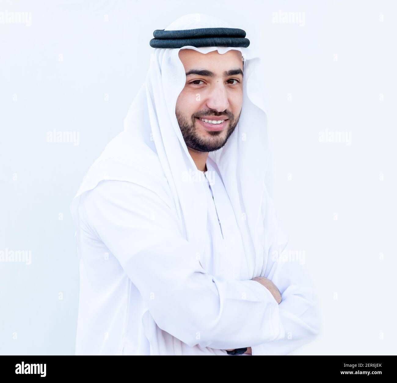 Arabic guy smiling and feeling happy Stock Photo - Alamy