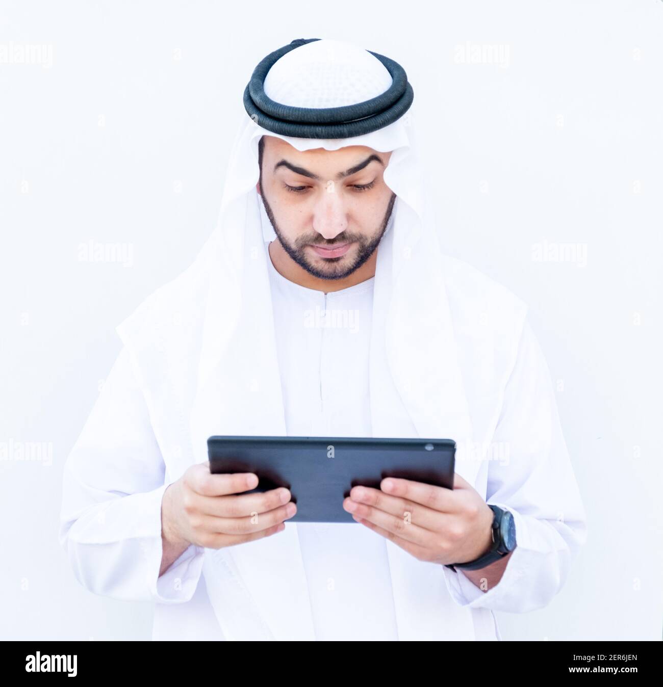 Arabic muslimman using tablet to study his lessons at school Stock ...