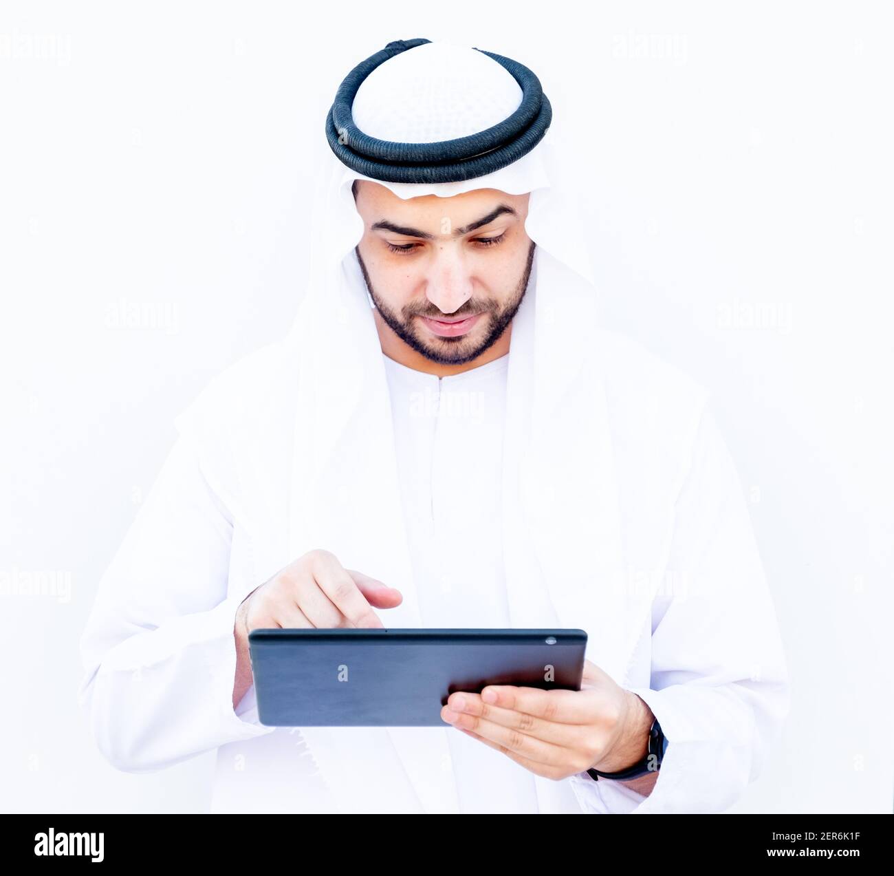 Arabic muslimman using tablet to study his lessons at school Stock ...
