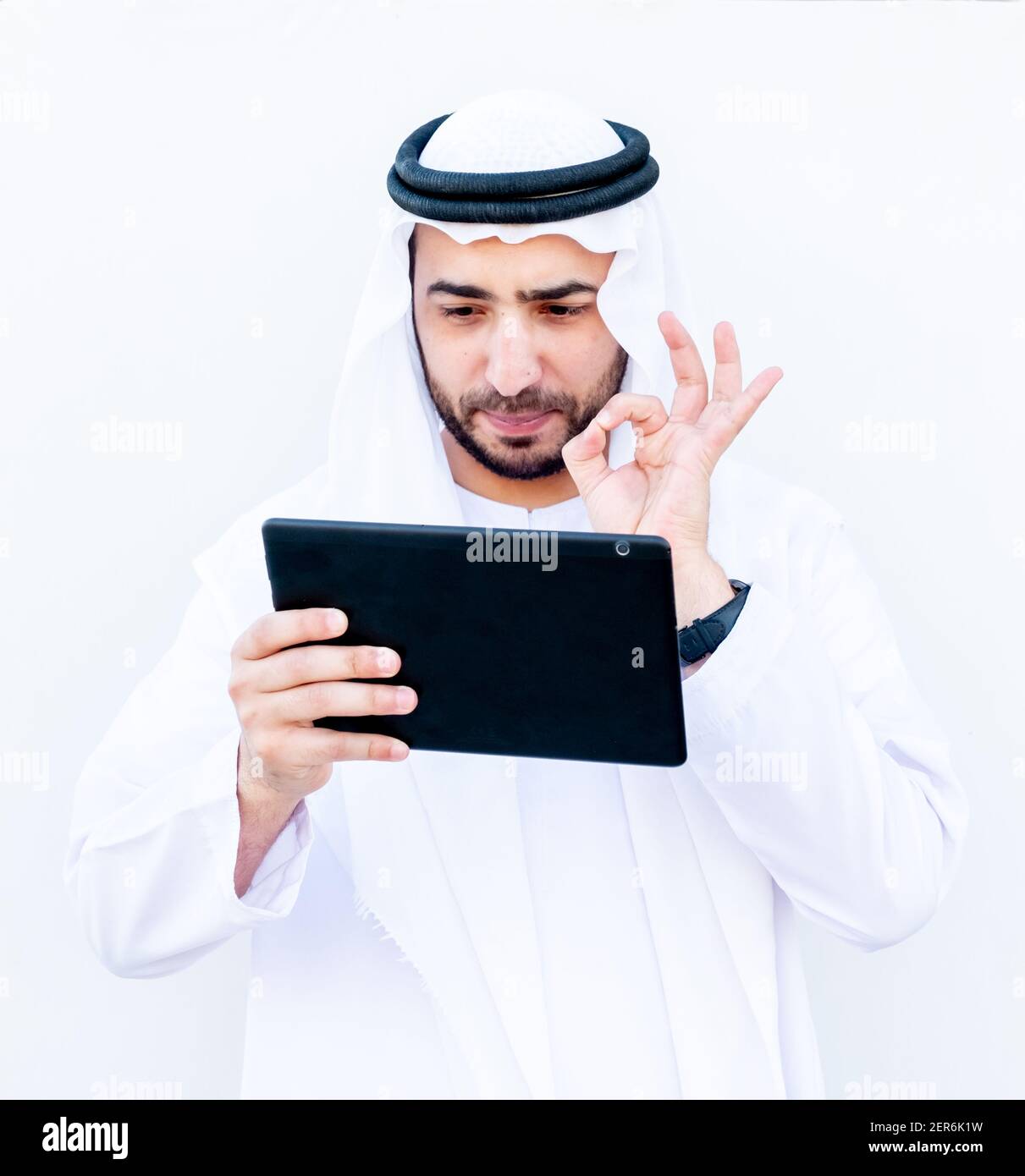 Arabic muslimman using tablet to study his lessons at school Stock ...