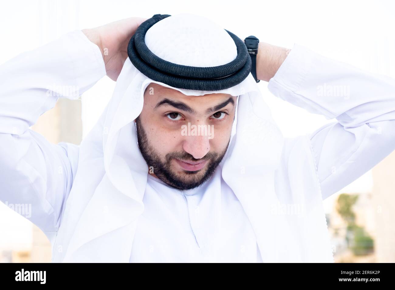 Arabic guy smiling and feeling happy Stock Photo - Alamy