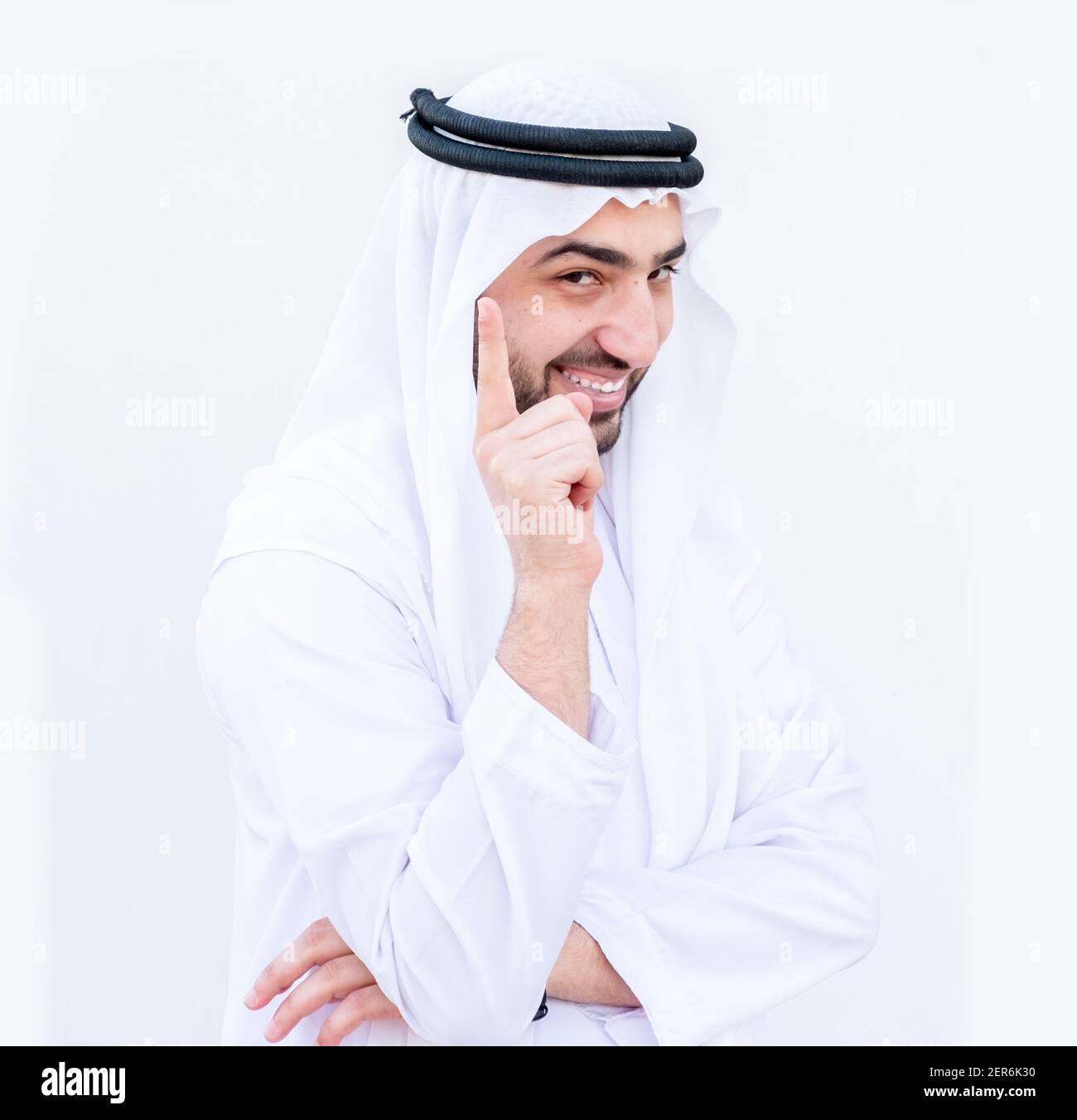 Arabic guy smiling and feeling happy Stock Photo - Alamy