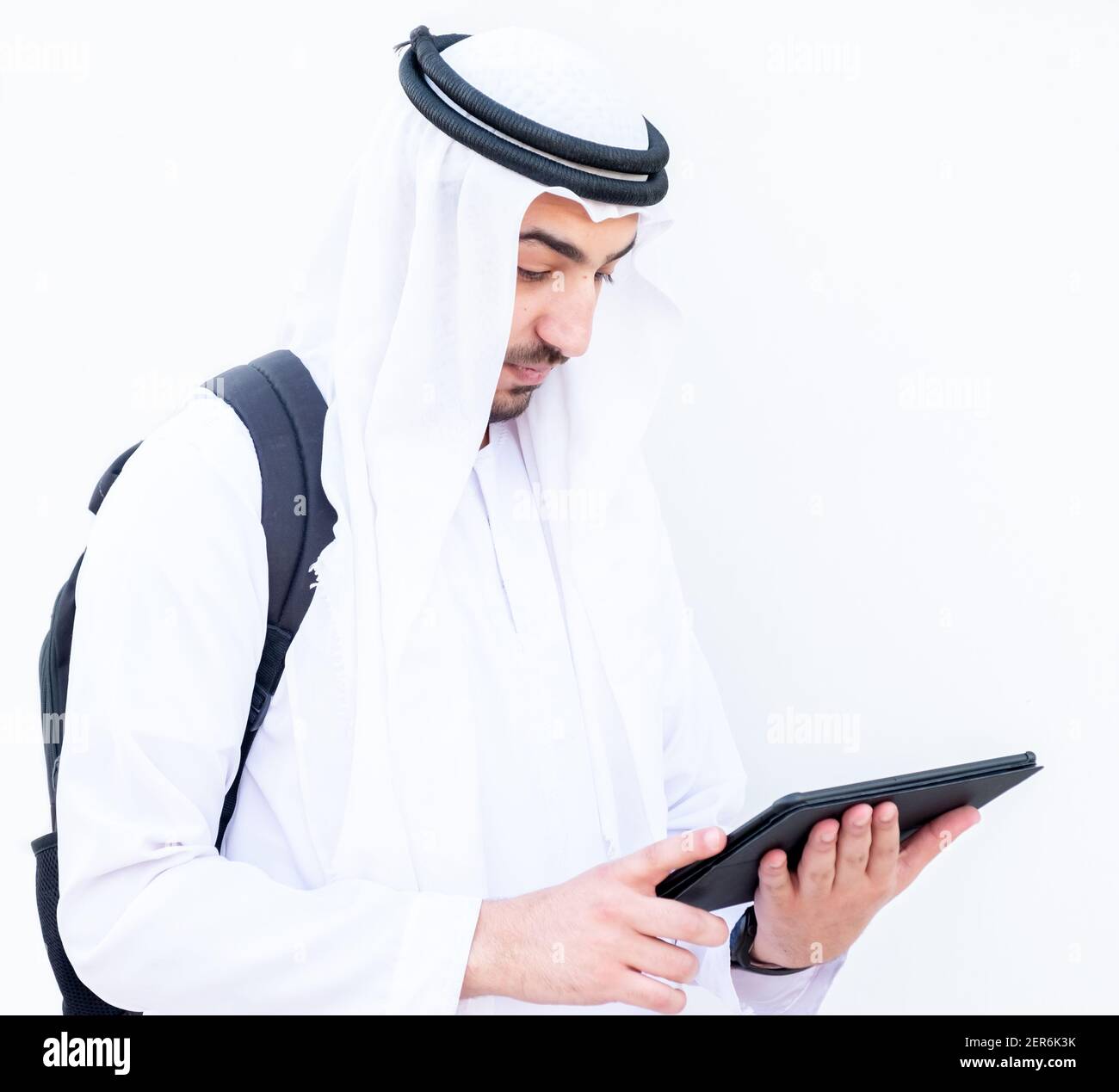 Arabic muslimman using tablet to study his lessons at school Stock ...