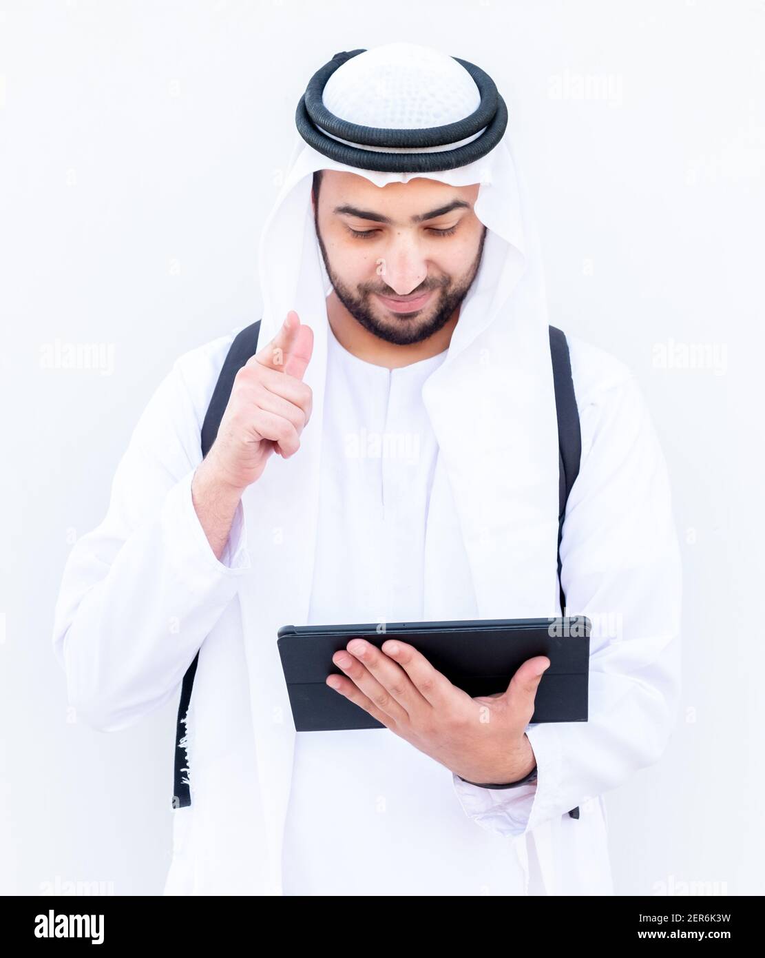 Arabic muslimman using tablet to study his lessons at school Stock ...