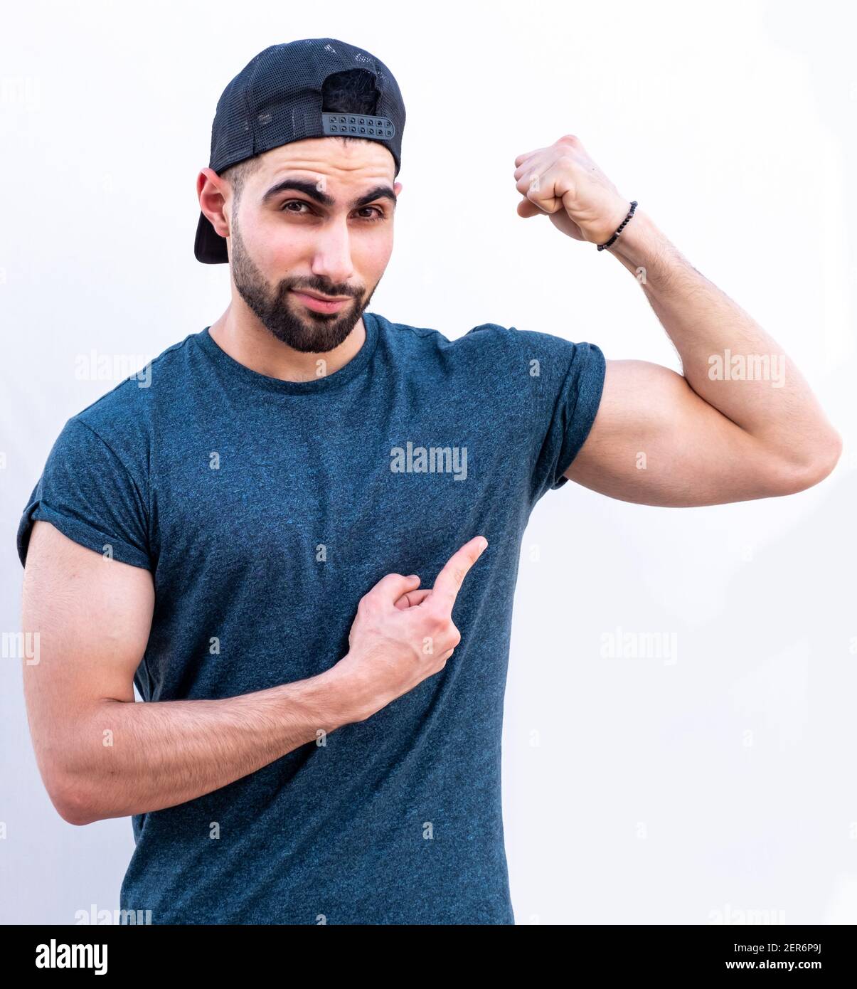 Guy pointing at his big strong hand muscle Stock Photo - Alamy