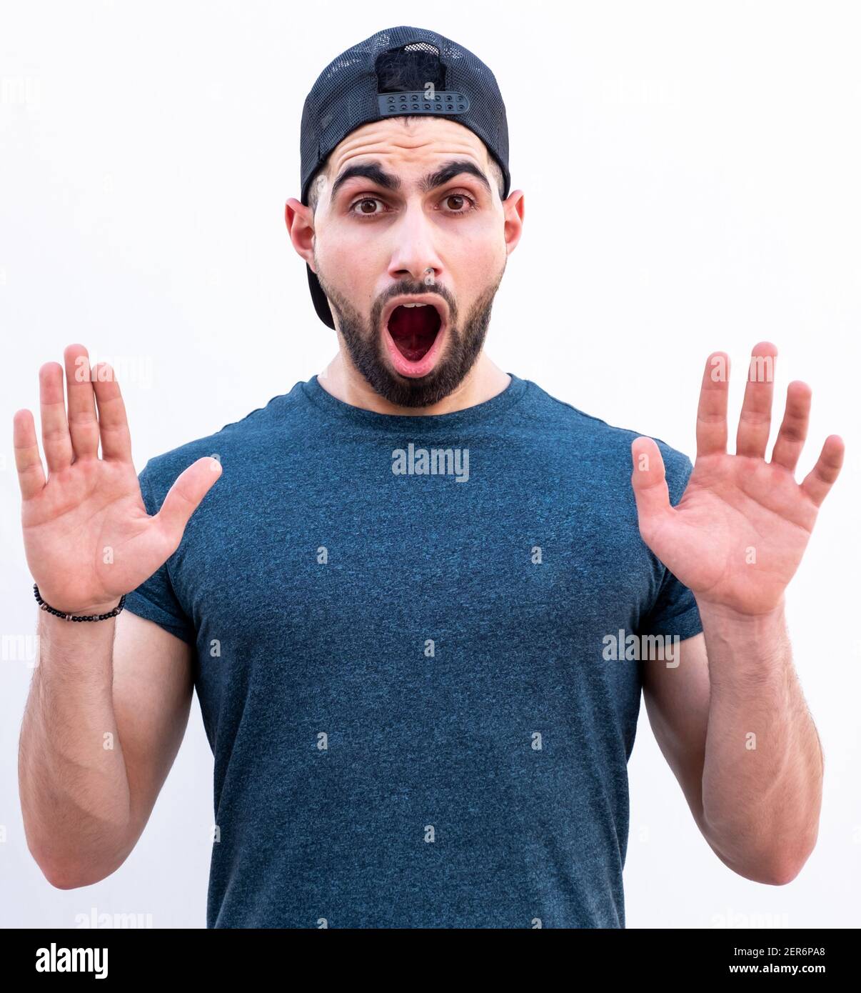 Guy feeling shocked and surprised by some news Stock Photo - Alamy