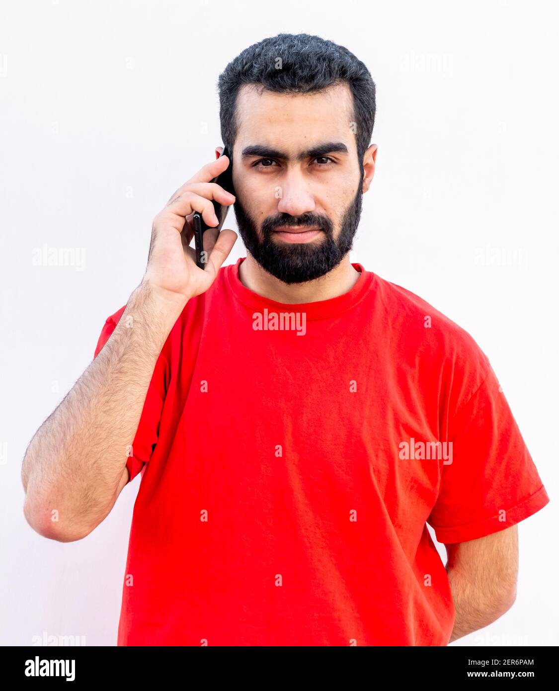 Guy making an expression of being angry and sad Stock Photo - Alamy