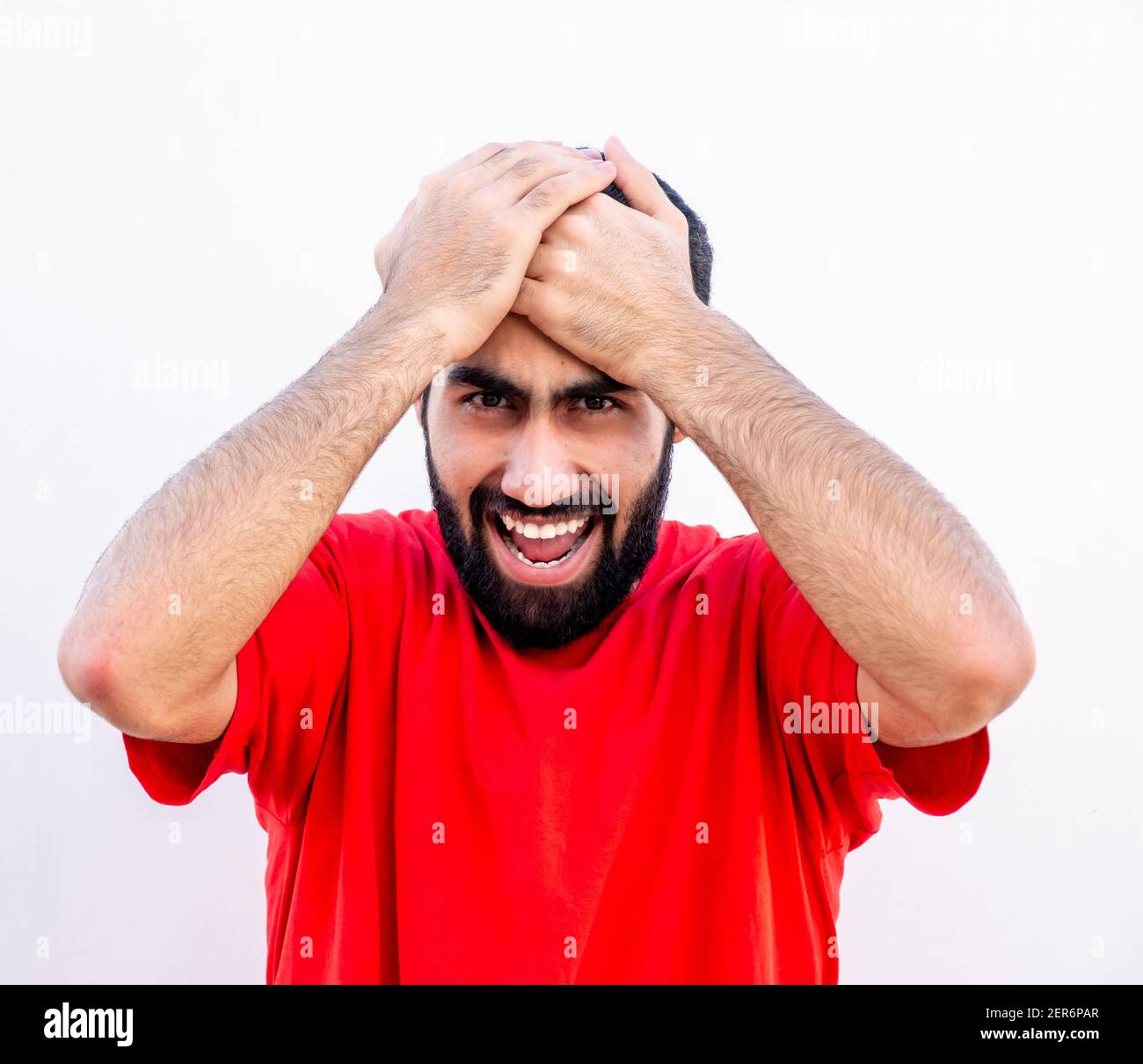 Guy feeling shocked and surprised by some news Stock Photo - Alamy