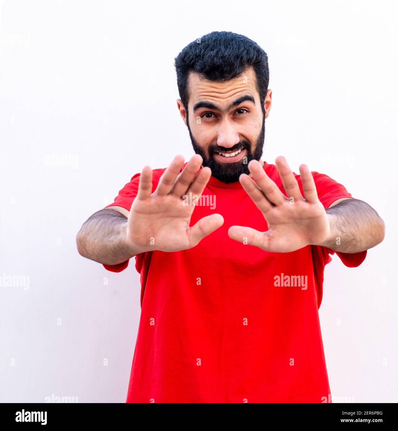Guy feeling shocked and surprised by some news Stock Photo - Alamy