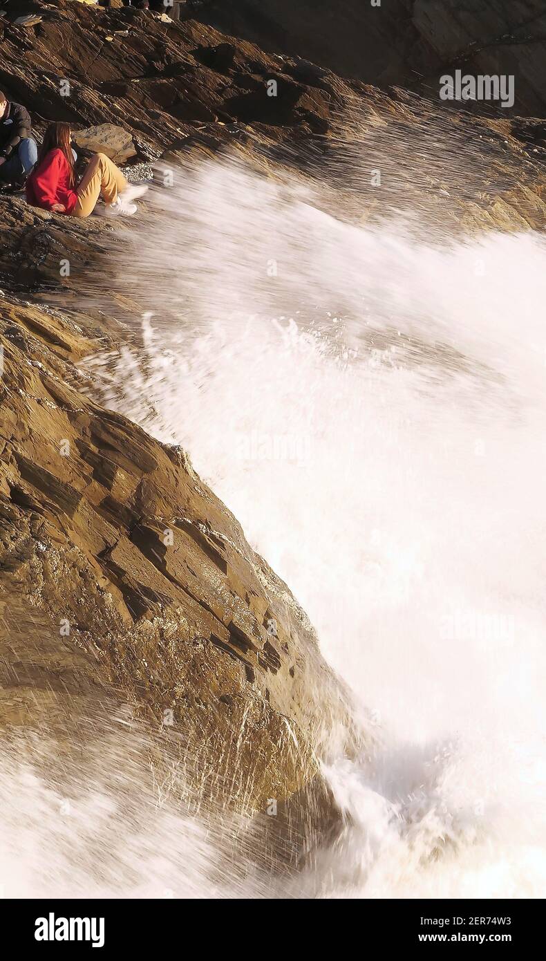 Wave catches unwary hi-res stock photography and images - Alamy