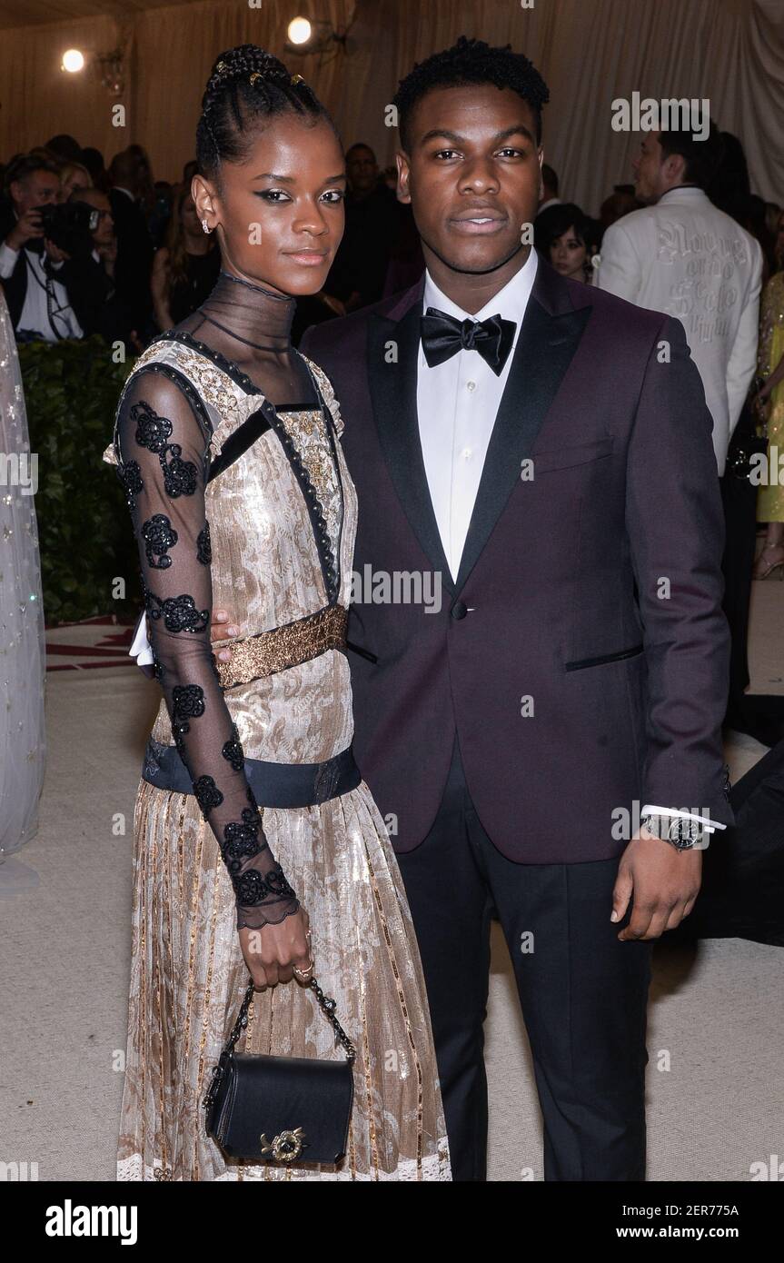 Letitia Wright and John Boyega walking on the red carpet at The ...