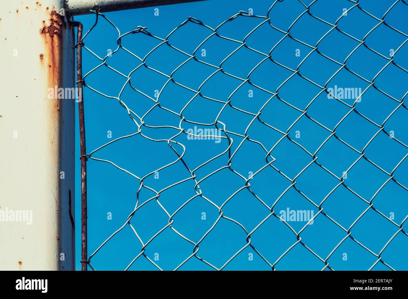 Broken wire fence Stock Photo - Alamy