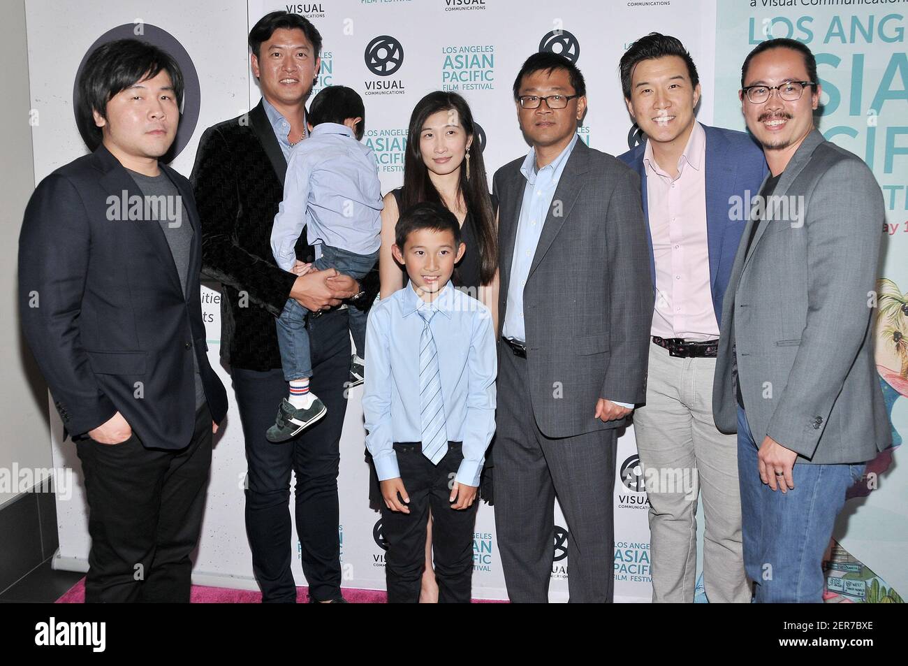 (L-R) Director Frank W. Chen, Subjects of the film Chien-Ming Wang ...