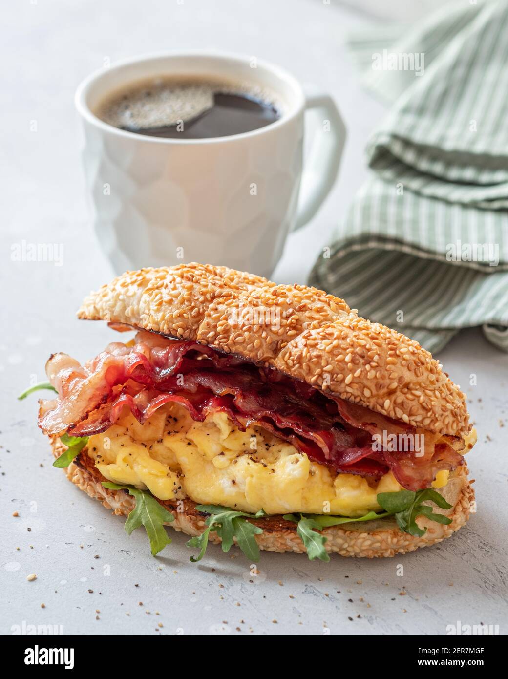 Breakfast bun with scrambled eggs and bacon Stock Photo - Alamy