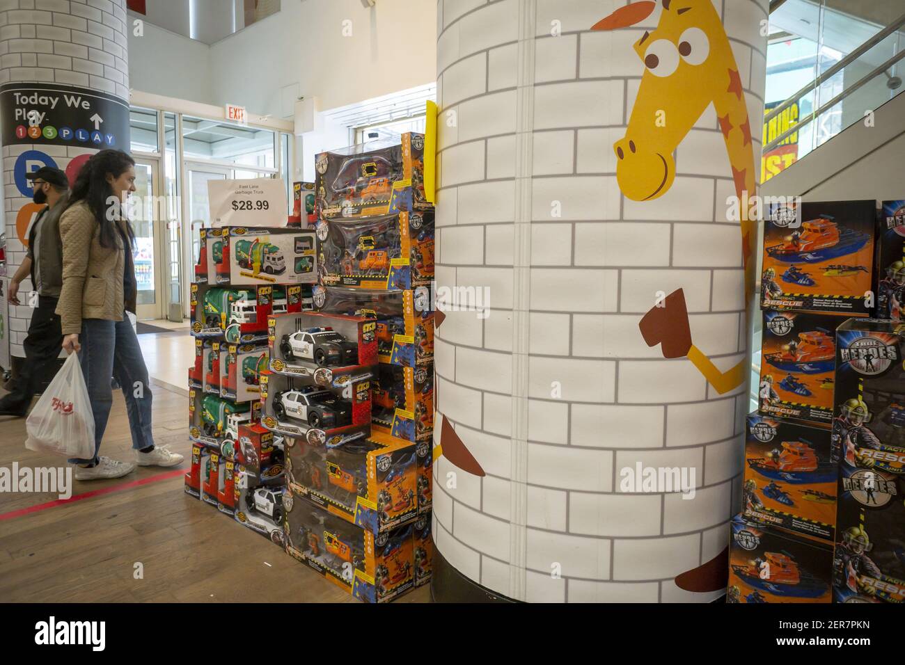 The Toys R Us store in Times Square in New York advertises that ...