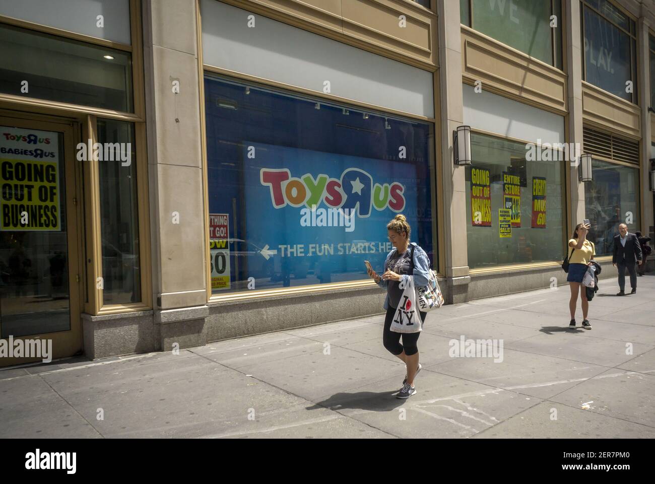 The Toys R Us store in Times Square in New York advertises that ...