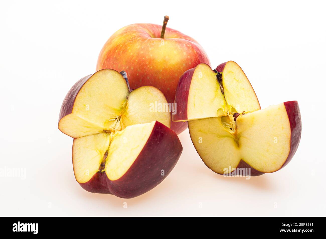 Red apple slices isolated on white background Stock Photo - Alamy