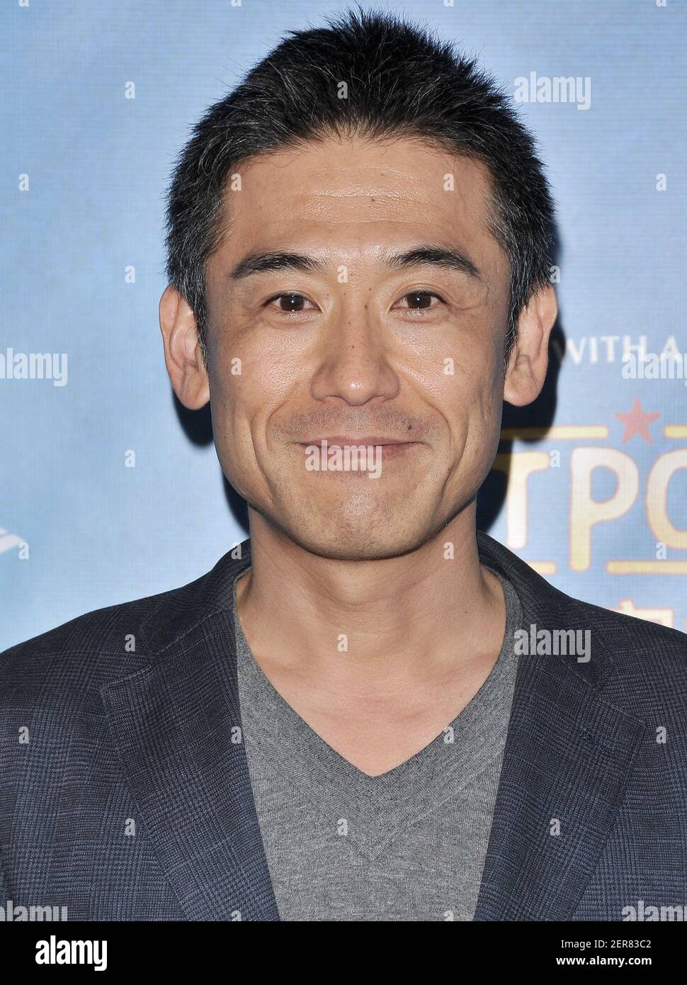 Yutaka Takeuchi arrives at the "Soft Power" Opening held at the ...