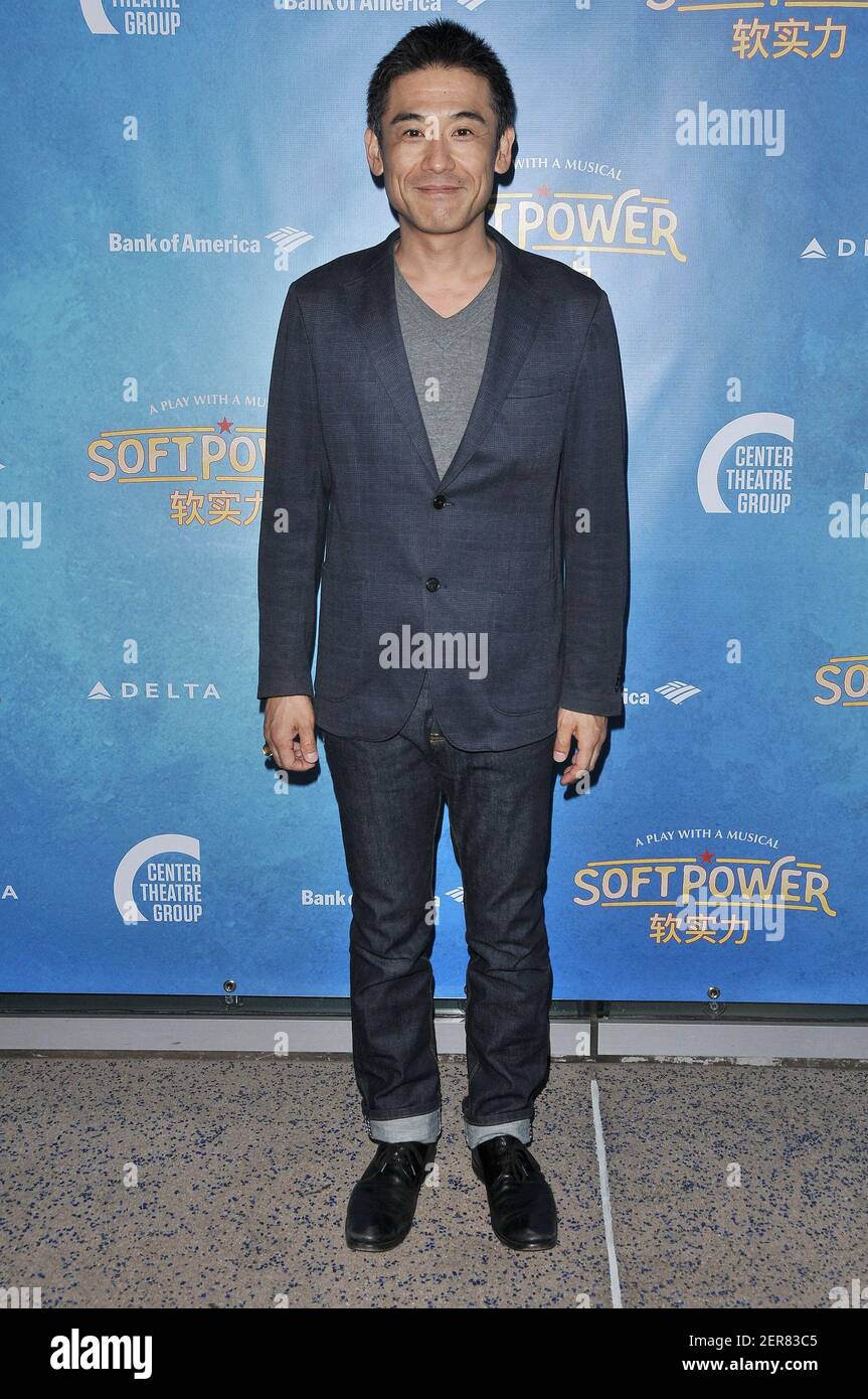 Yutaka Takeuchi arrives at the "Soft Power" Opening held at the ...