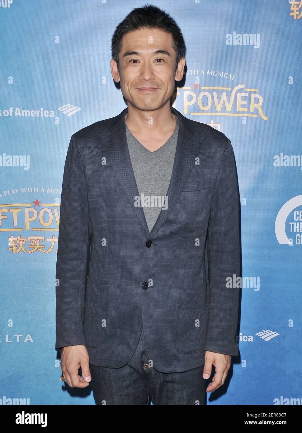 Yutaka Takeuchi arrives at the "Soft Power" Opening held at the ...